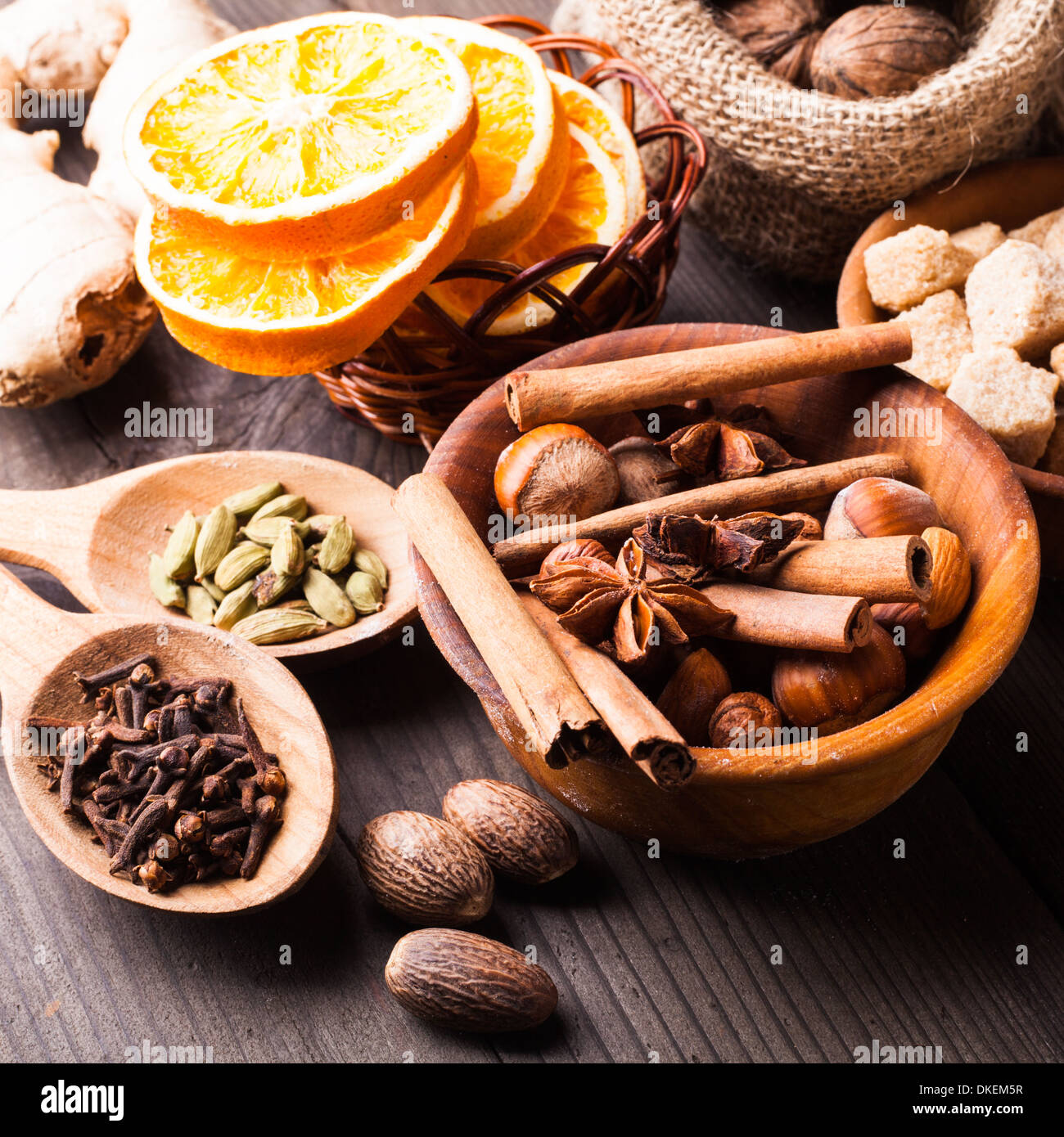 Christmas spices - nuts, brown sugar, dried orange, kandamon, cloves ...
