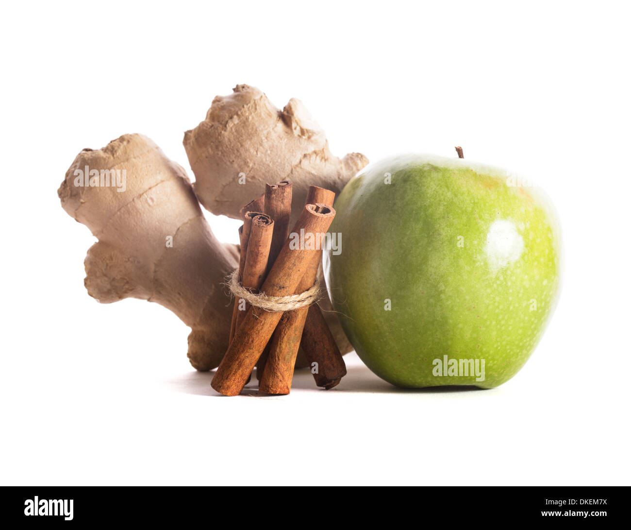 Apple, cinnamon and ginger isolated on white Stock Photo - Alamy