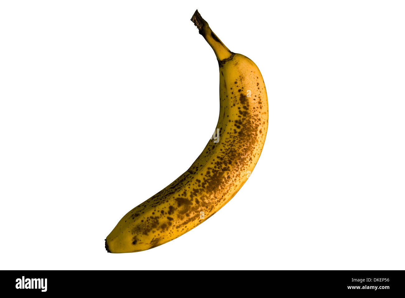 Cut Out. Single ripe Banana with brown spots on white background Stock ...
