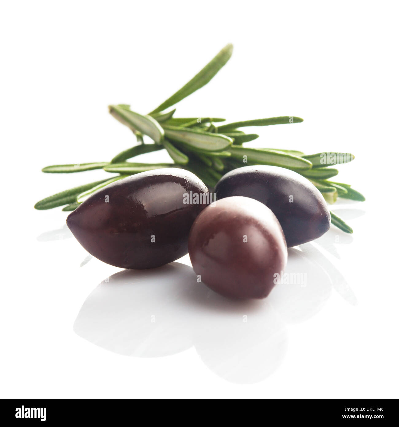 Olives calamata with leaves isolated on white Stock Photo - Alamy