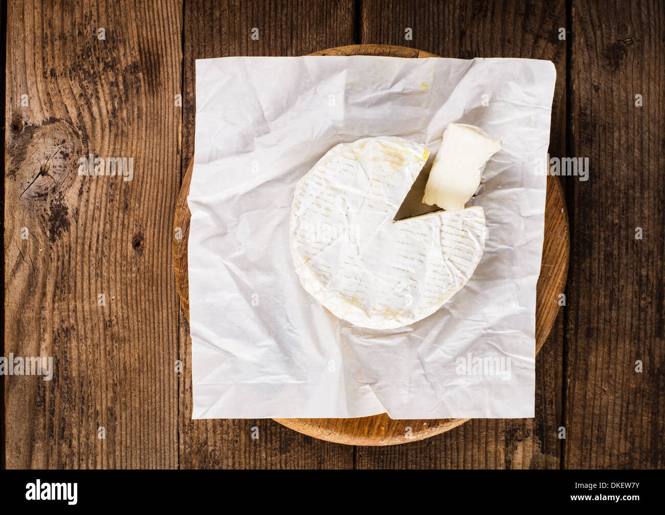 camembert cheese round and section on the table Stock Photo - Alamy