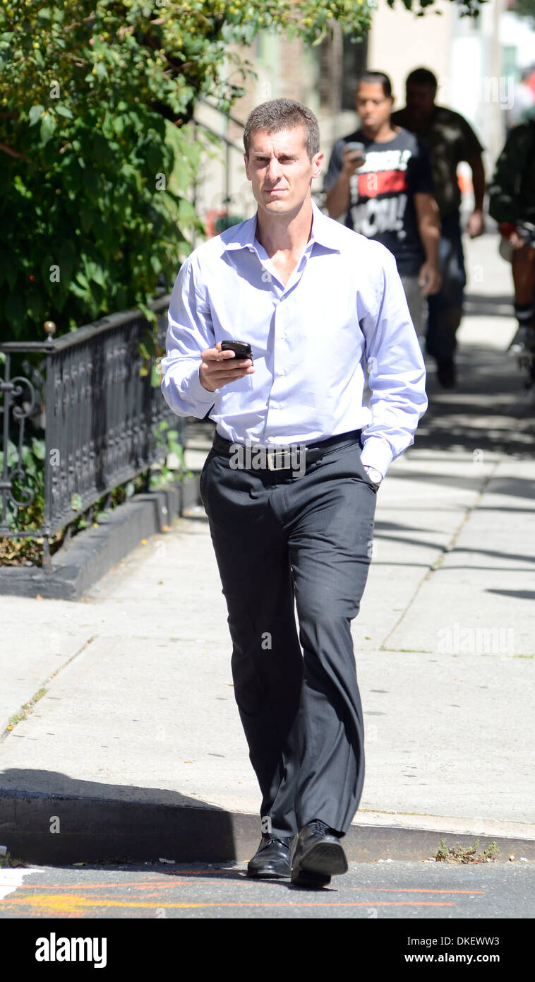 Jason Hoppy heads out for a walk in his neighborhood New York City, USA ...