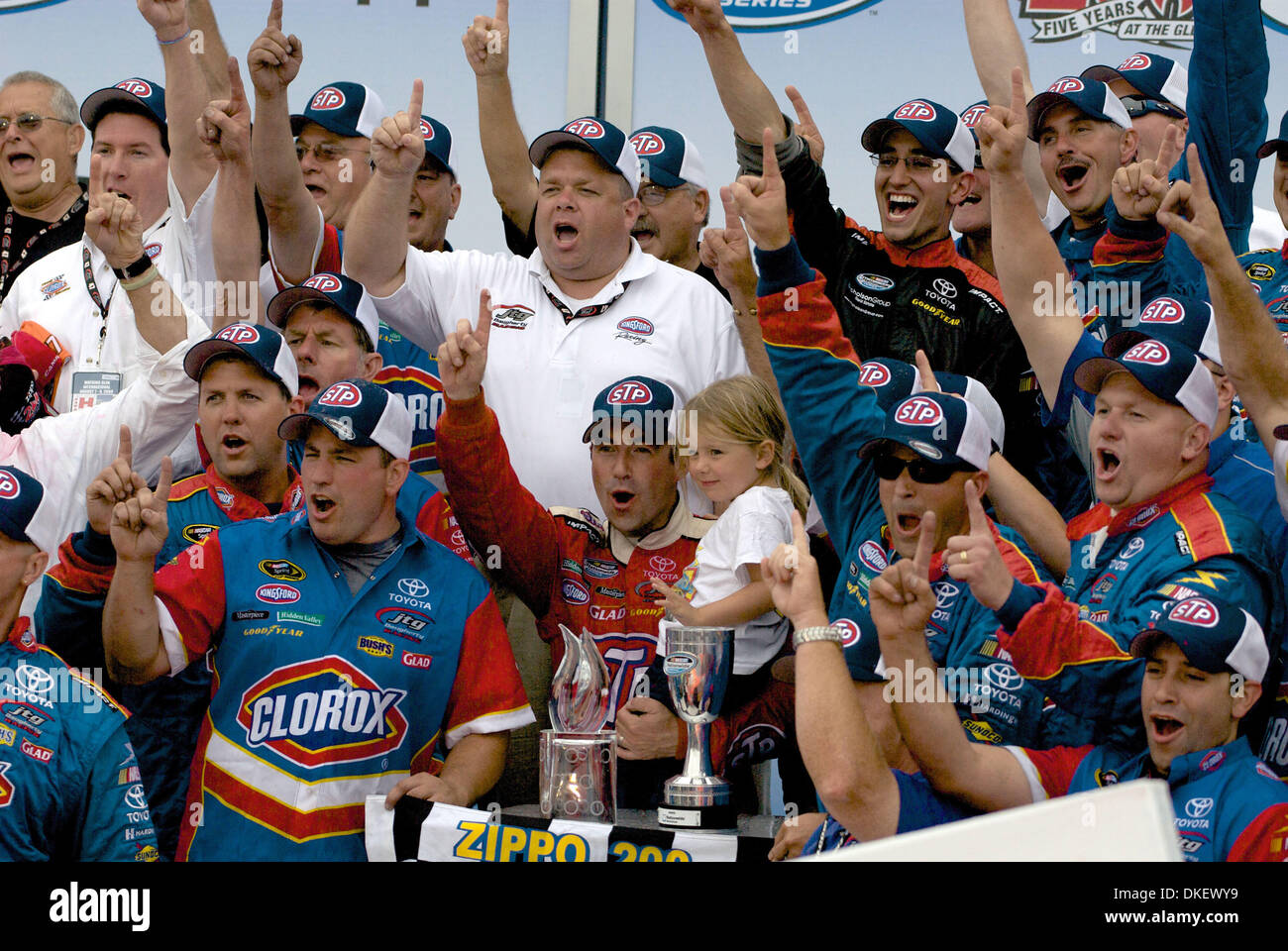 08 August 2009: Marcos Ambrose, his daughter and his team celebrate ...