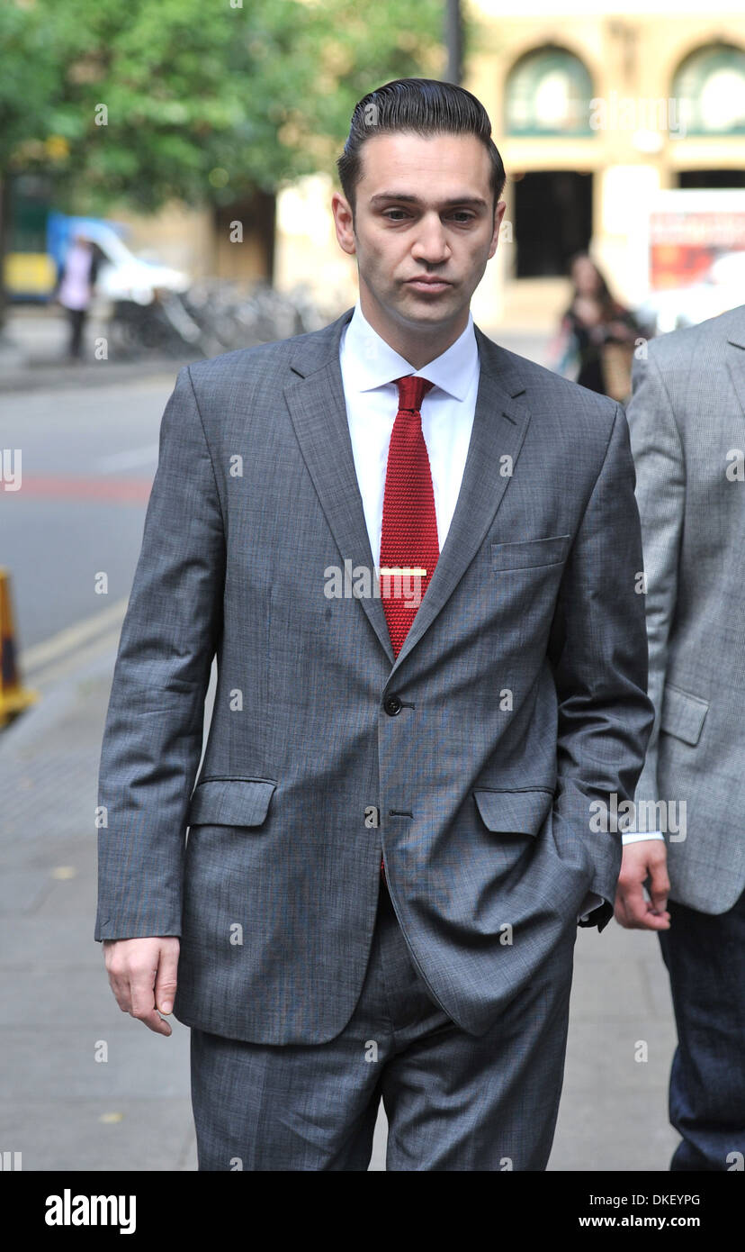 Reg Traviss appears in court on two counts of rape at a trial held at ...