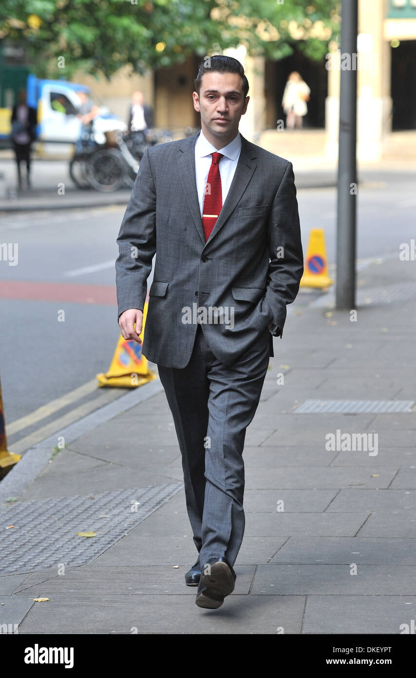 Reg Traviss appears in court on two counts of rape at a trial held at ...