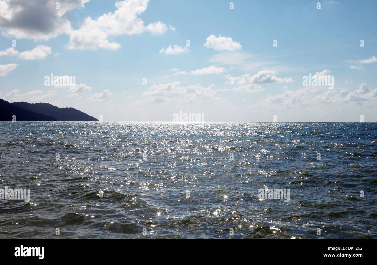 It's a photo of a sea view landscape with an island. It's a sunny ...