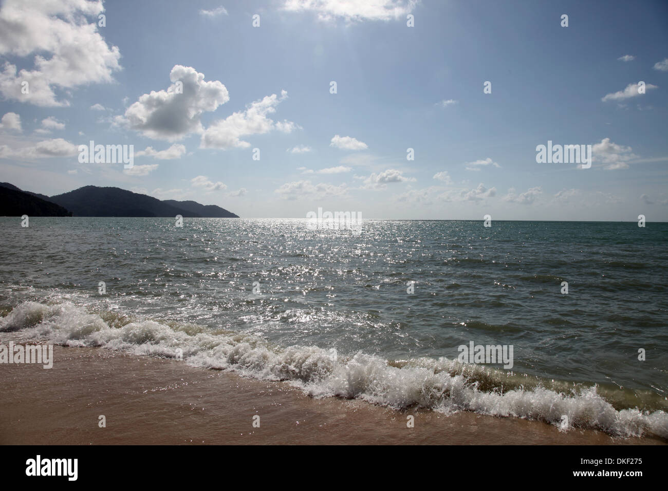 It's a photo of a sea view landscape with an island. It's a sunny ...