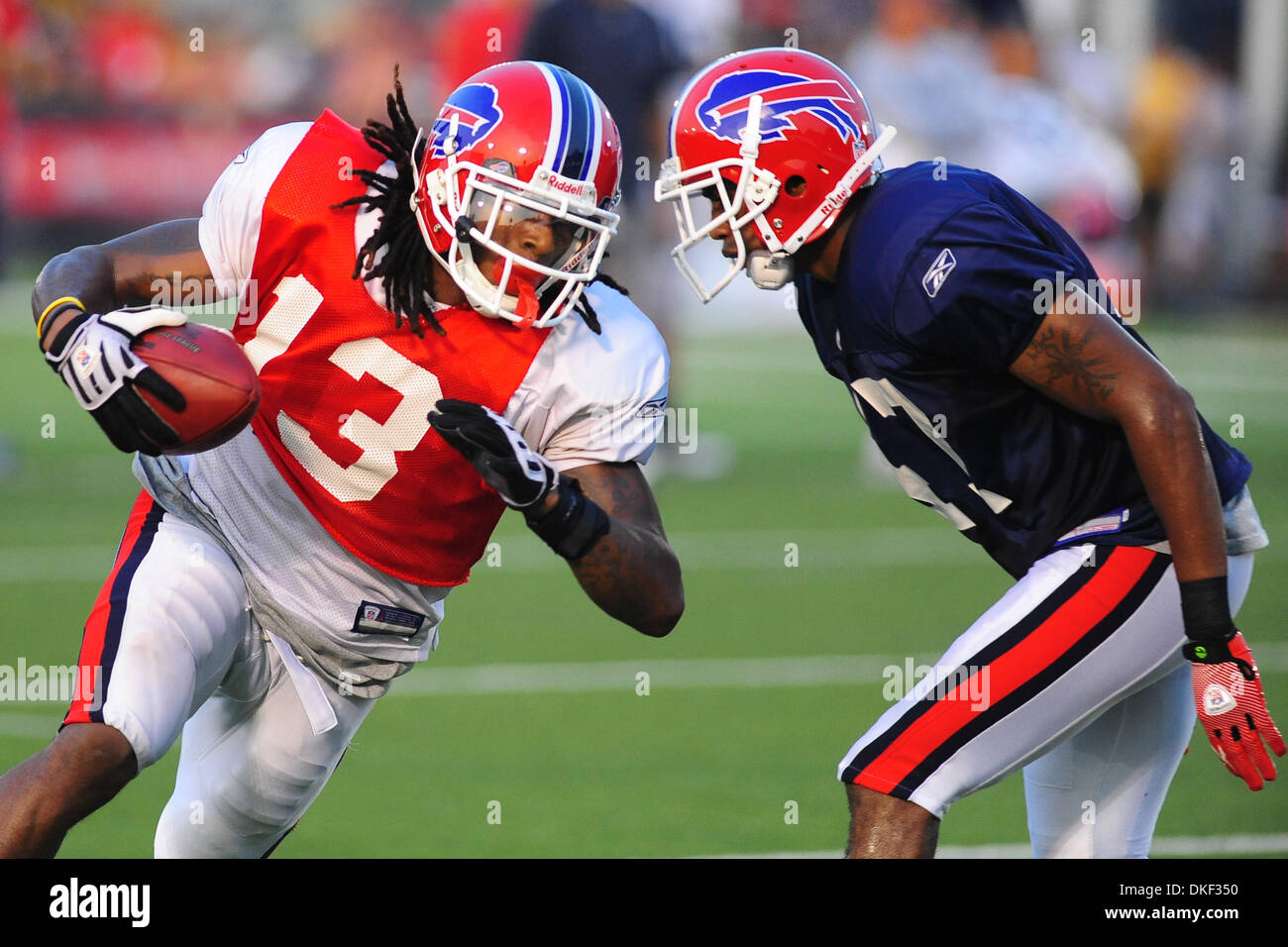 17 August 2009: Buffalo Bills wide receiver Steve Johnson ,left, lowers ...