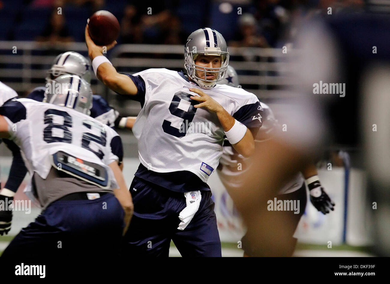 Quarterback Tony Romo (09) attempts a pass during practice at the ...