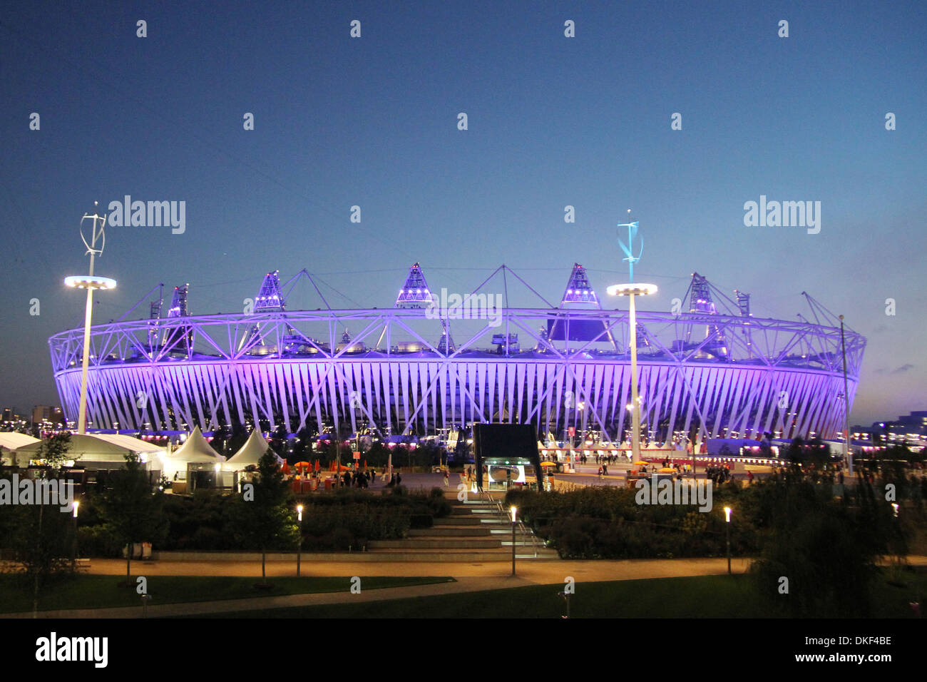 The Olympic stadium lights up during the evening Stock Photo - Alamy