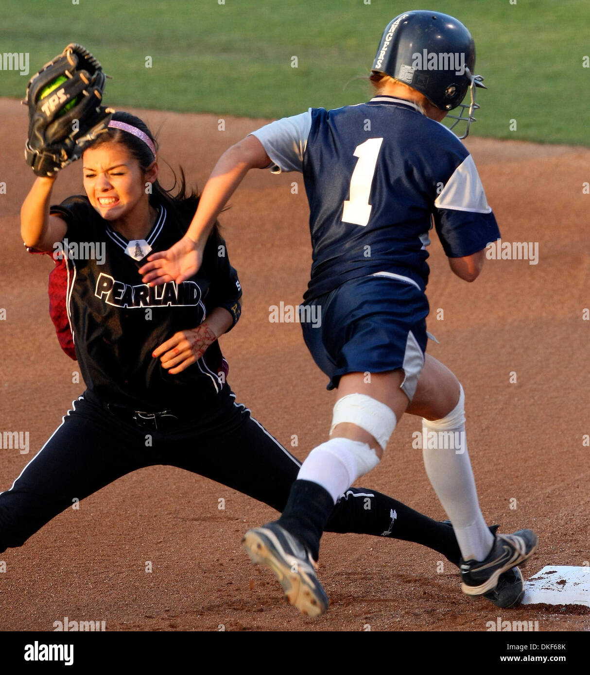 FOR SPORTS - Pearland's Megan Coronado makes the out at first base on ...