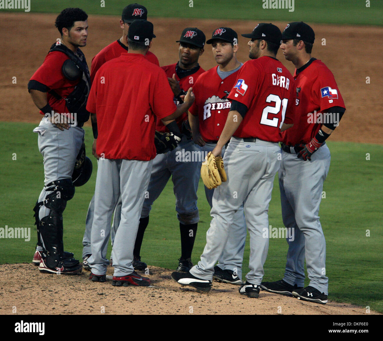 The Frisco Roughriders gather on the mound in the bottom of the fourth ...