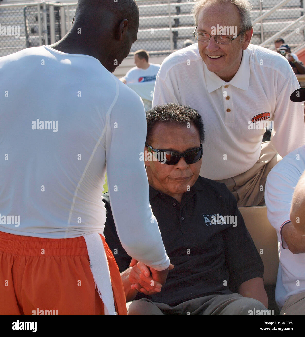 Bengals' Chad Ochocinco, left, shook hands with Muhammad Ali, with ...