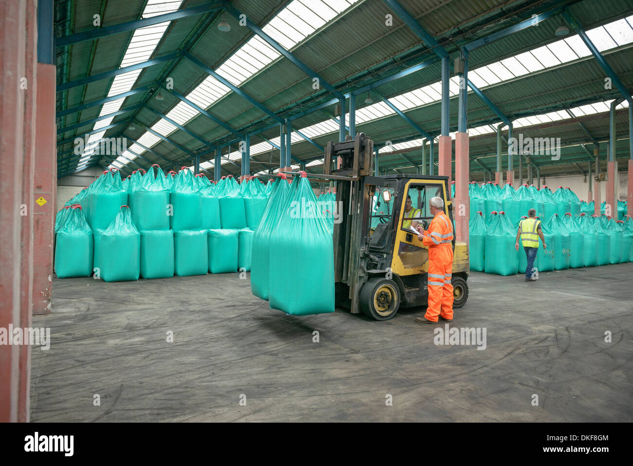 Man standing fork lift truck hi-res stock photography and images - Alamy
