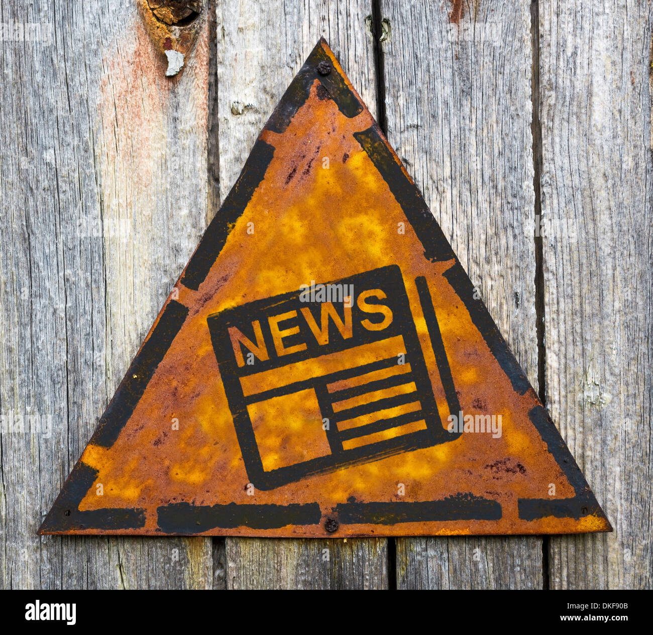 News Concept on Rusty Warning Sign Stock Photo - Alamy
