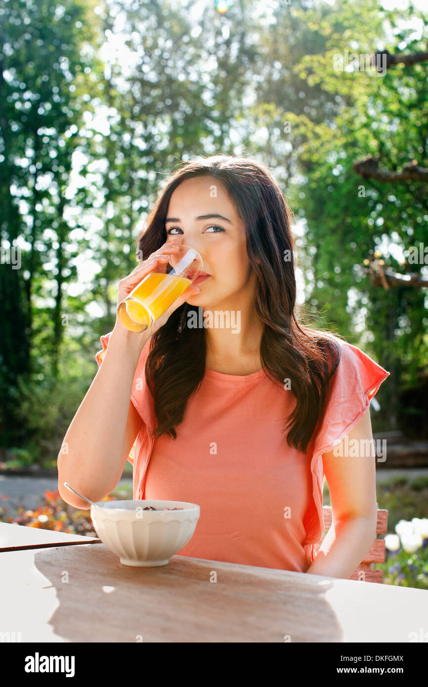Drinking orange juice tree hi-res stock photography and images - Alamy