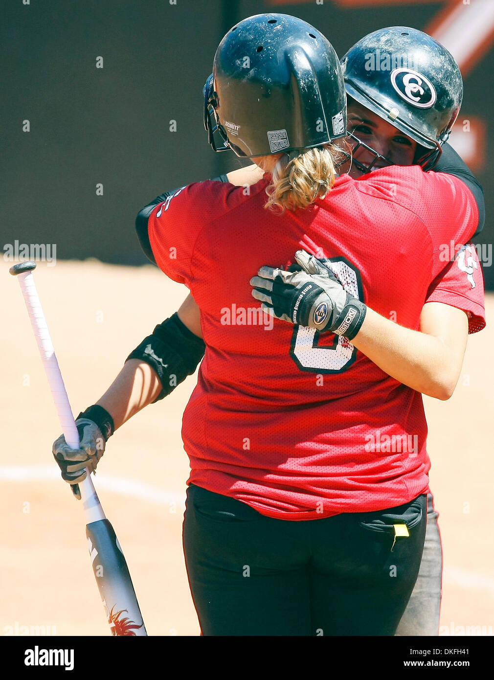 FOR SPORTS - New Braunfels Canyon's Aby Kester (left) hugs teammate ...