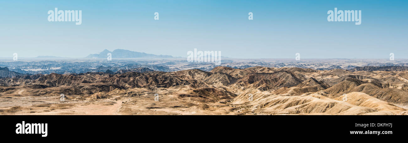 Rocky landscape furrowed by erosion, dry river bed of the Swakop River ...