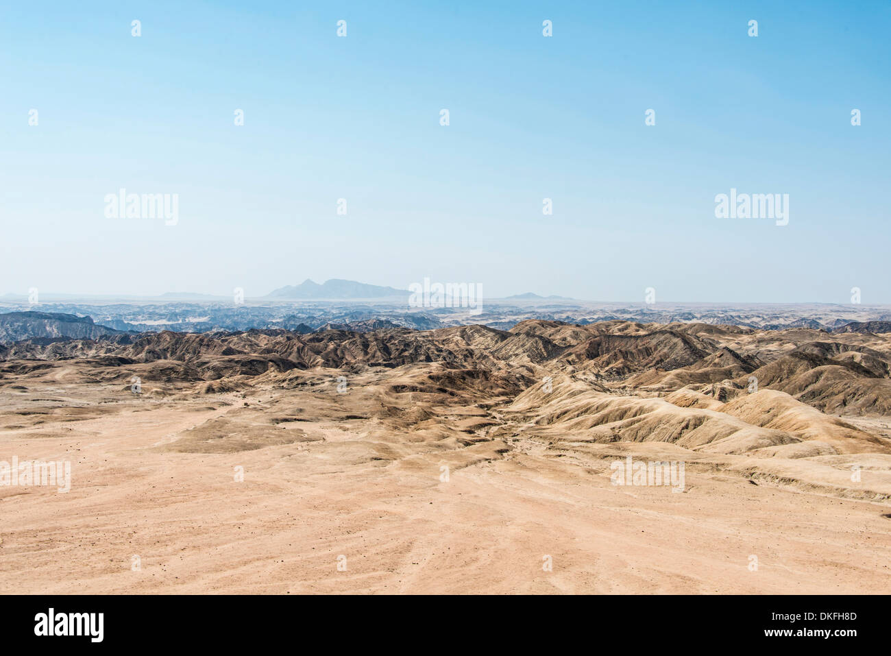 Rocky landscape furrowed by erosion, dry river bed of the Swakop River ...