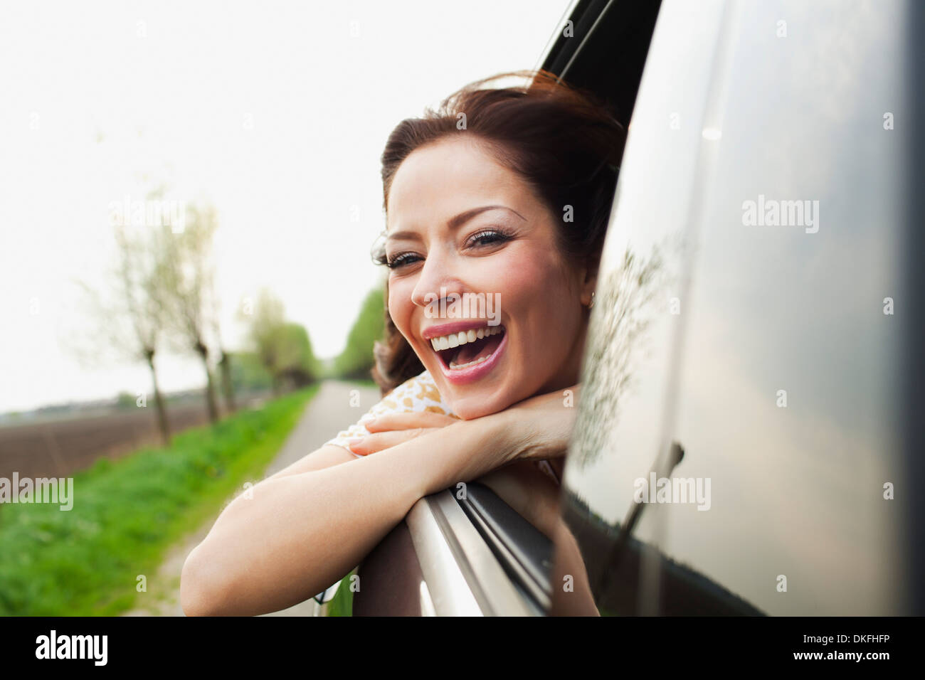 Young woman leaning out car hi-res stock photography and images - Alamy Young woman leaning out car hi-res stock photography and images - Alamy