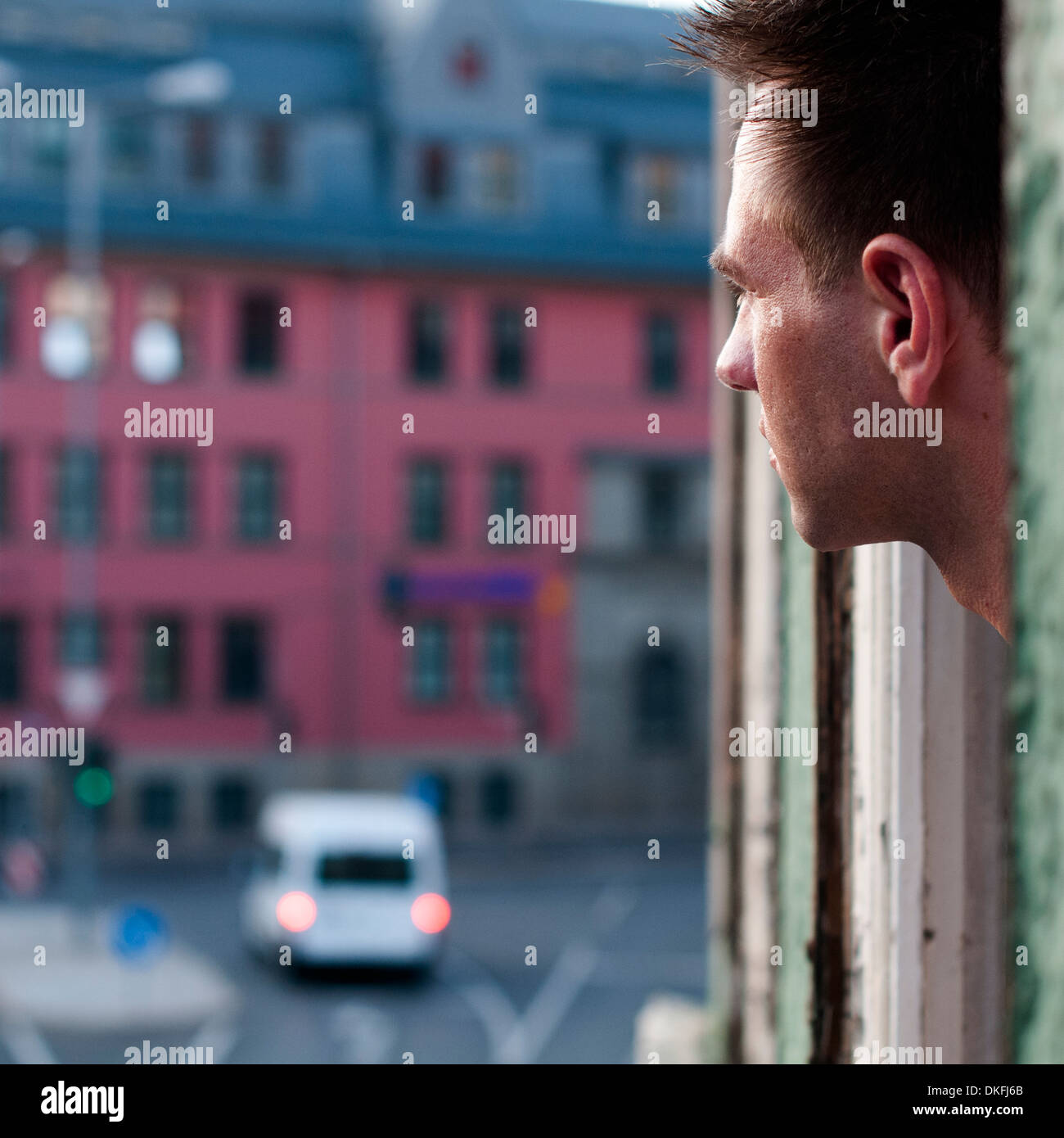 Man gazing out the window Stock Photo - Alamy