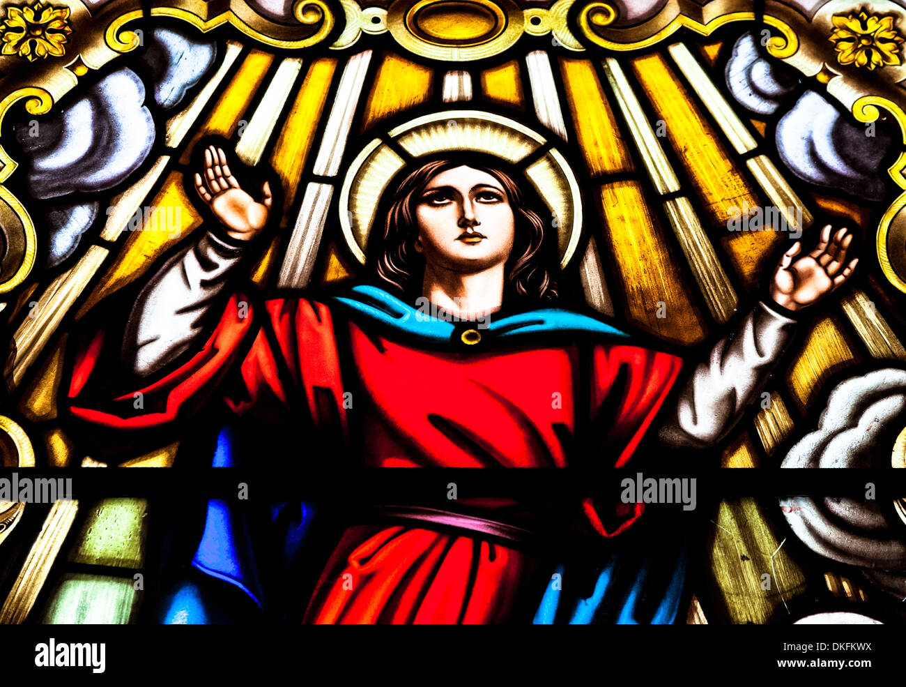 Wonderful ancient stained glass window formed of multiple colors of the ...