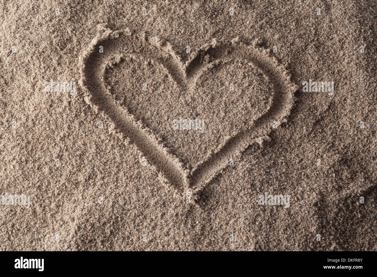 heart in sand Stock Photo - Alamy