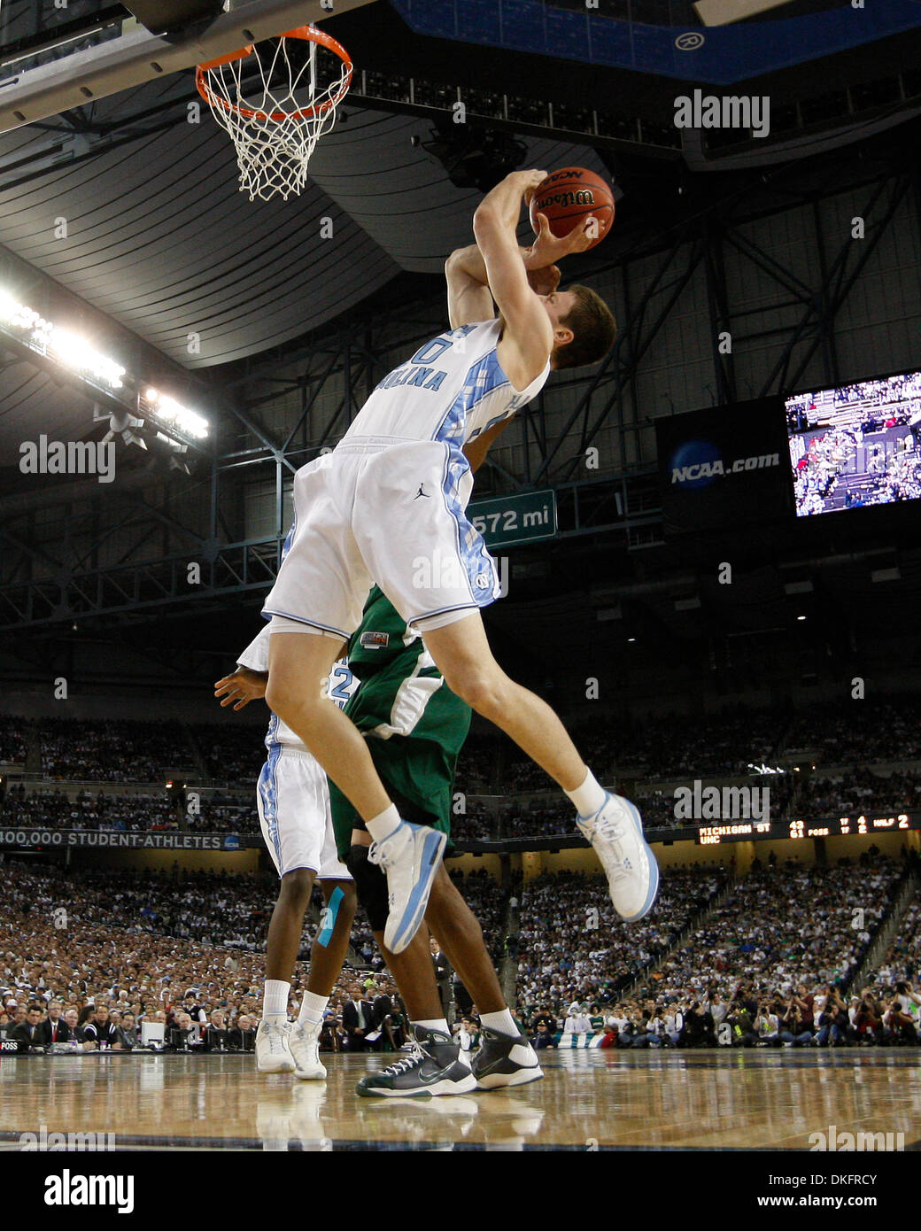 Tyler Hansbrough got fouled hard by Delvon Roe,10, as North Carolina ...