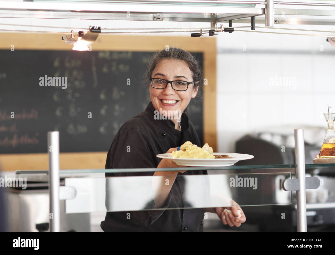 Older woman professional chef hi-res stock photography and images - Alamy