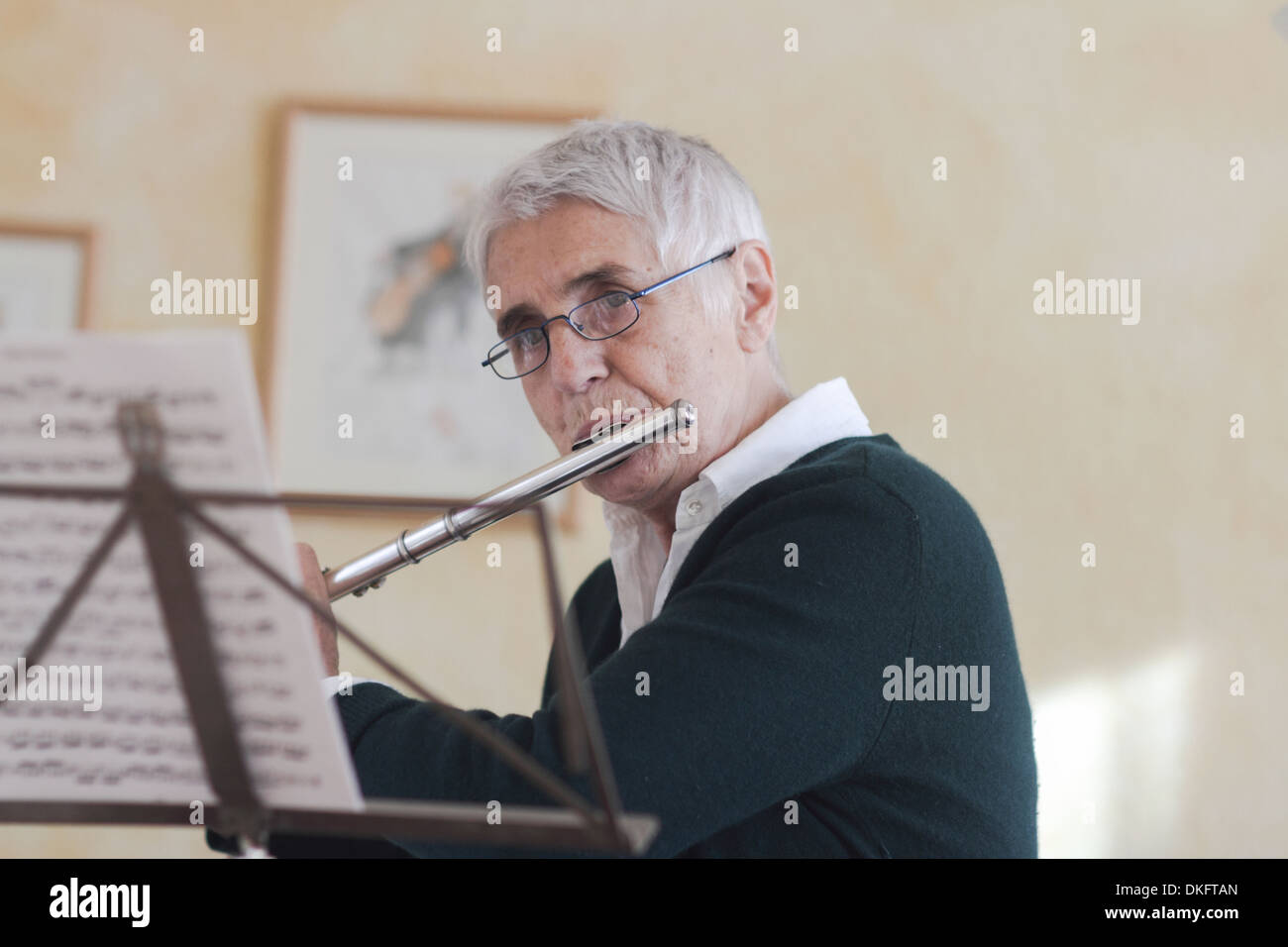 Flute woman playing close hi-res stock photography and images - Alamy