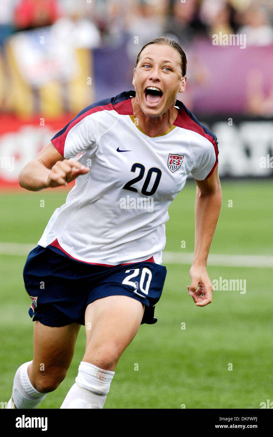 July 19, 2009: USA's Abby Wambach celebrates after scoring her 100th ...