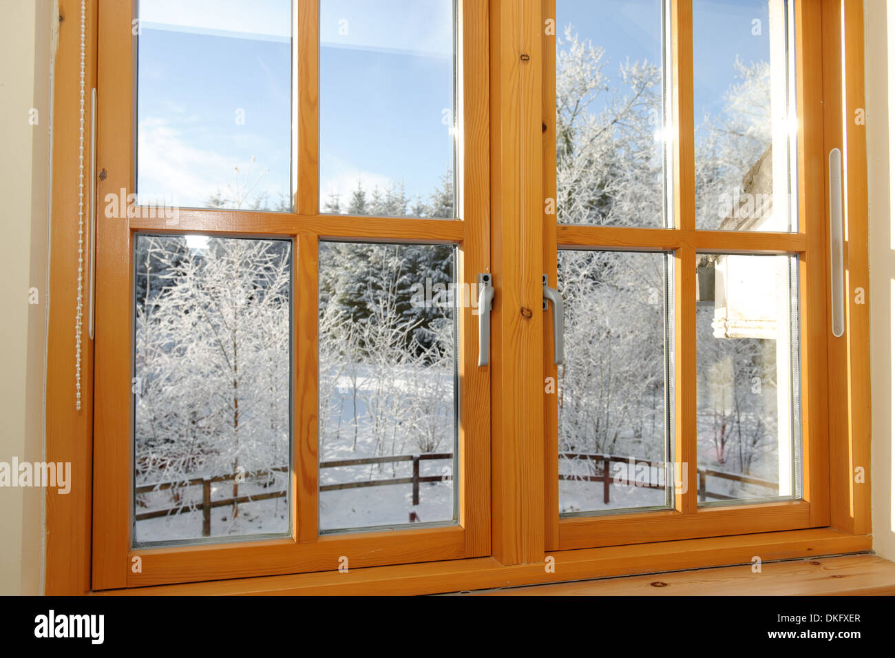 Early morning frosty winter view through a window Stock Photo - Alamy