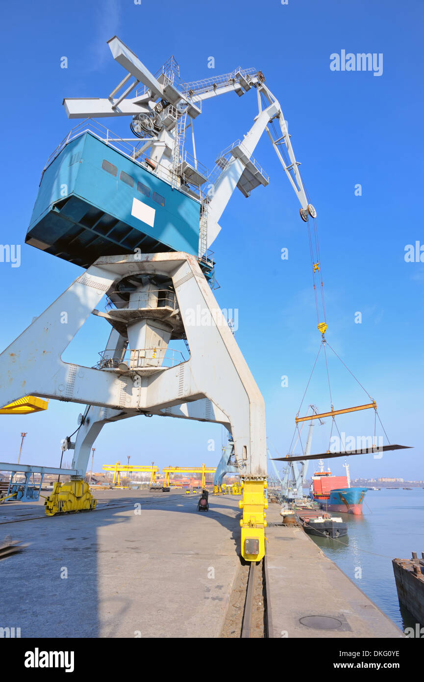 Container ship loading steel plates hi-res stock photography and images ...