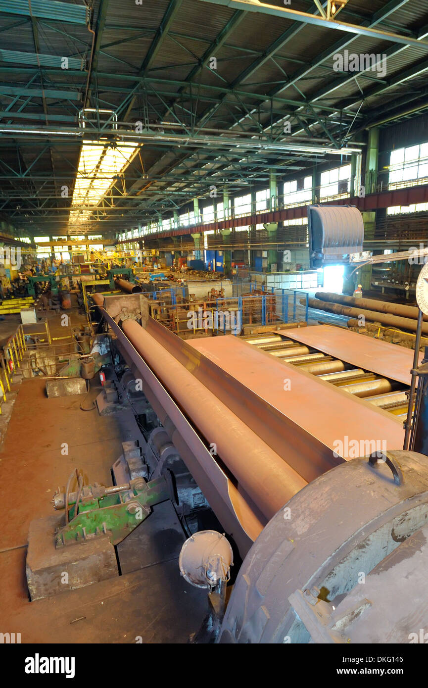 industrial machine for making steel pipes inside of factory Stock Photo ...