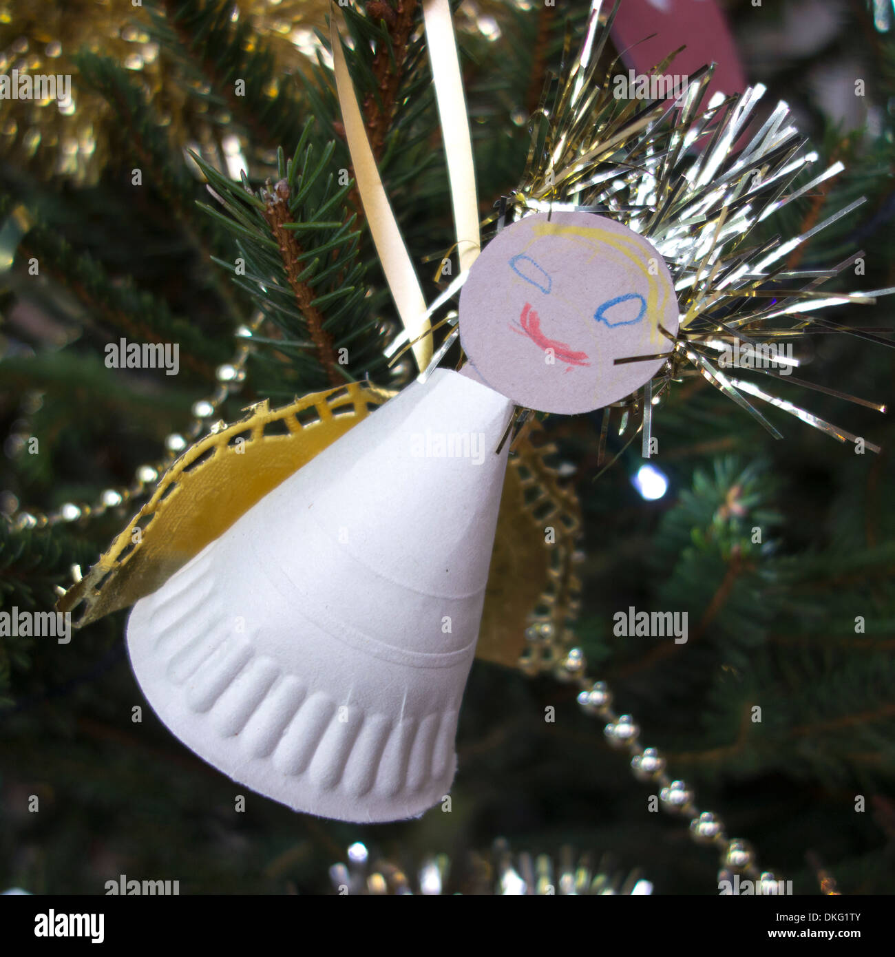 Angel on tree hi-res stock photography and images - Alamy