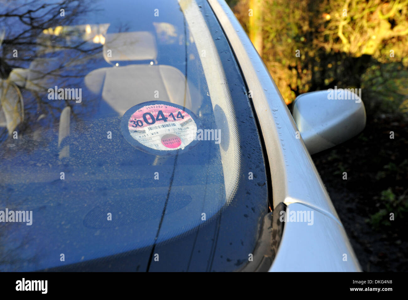 car tax disc on windscreen Stock Photo - Alamy