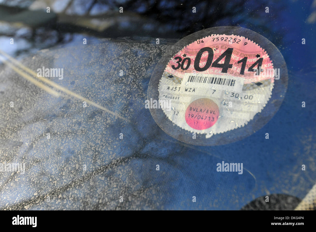 car tax disc on windscreen Stock Photo - Alamy