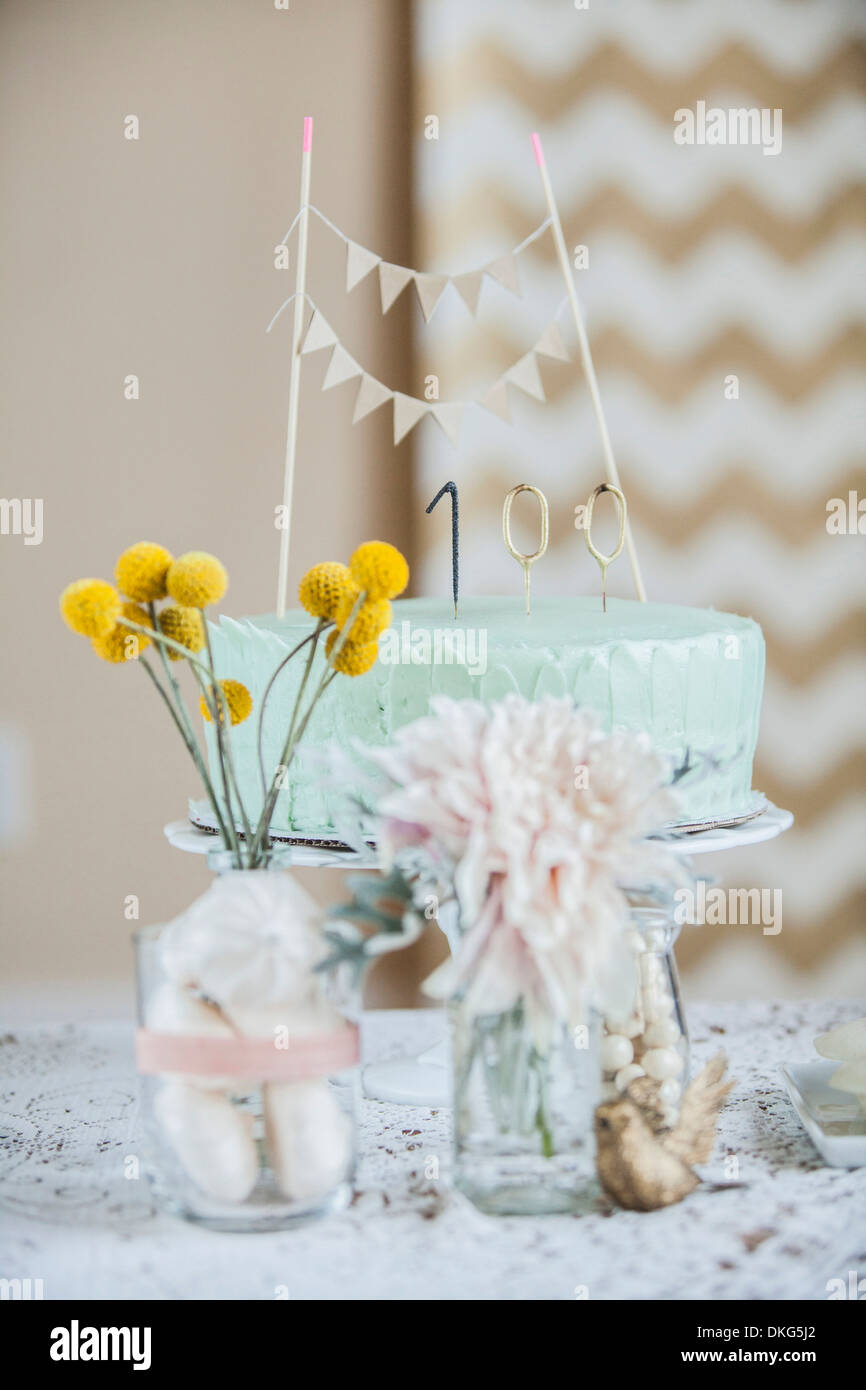 Still life of celebration cake with flowers and decoration Stock Photo ...