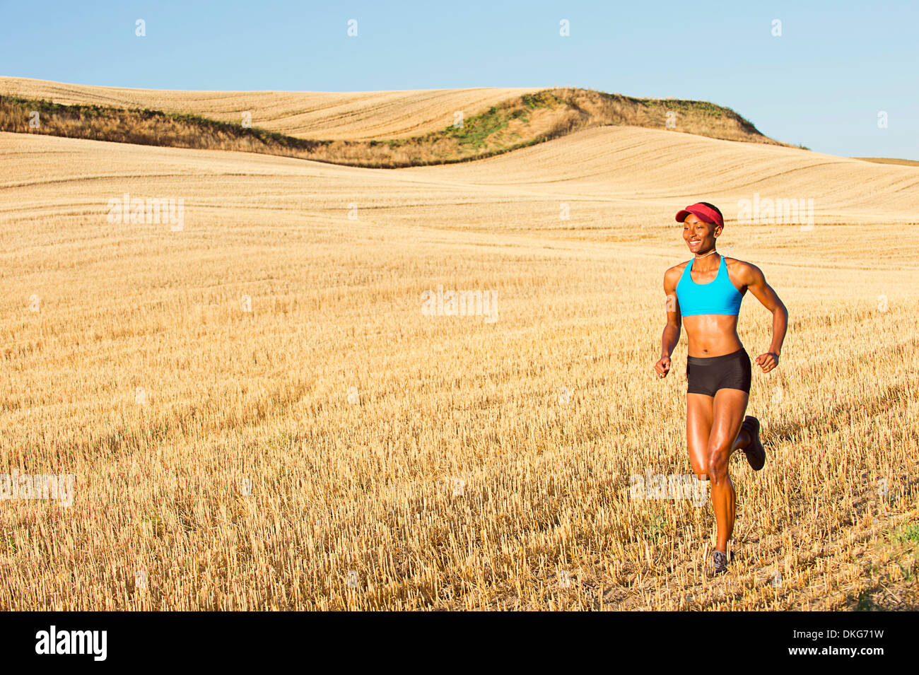 Woman Running In Field