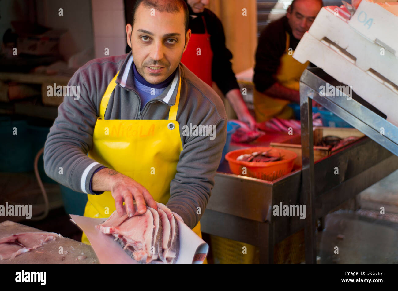 Man selling swordfish at local fish market in Palermo Sicily Stock ...