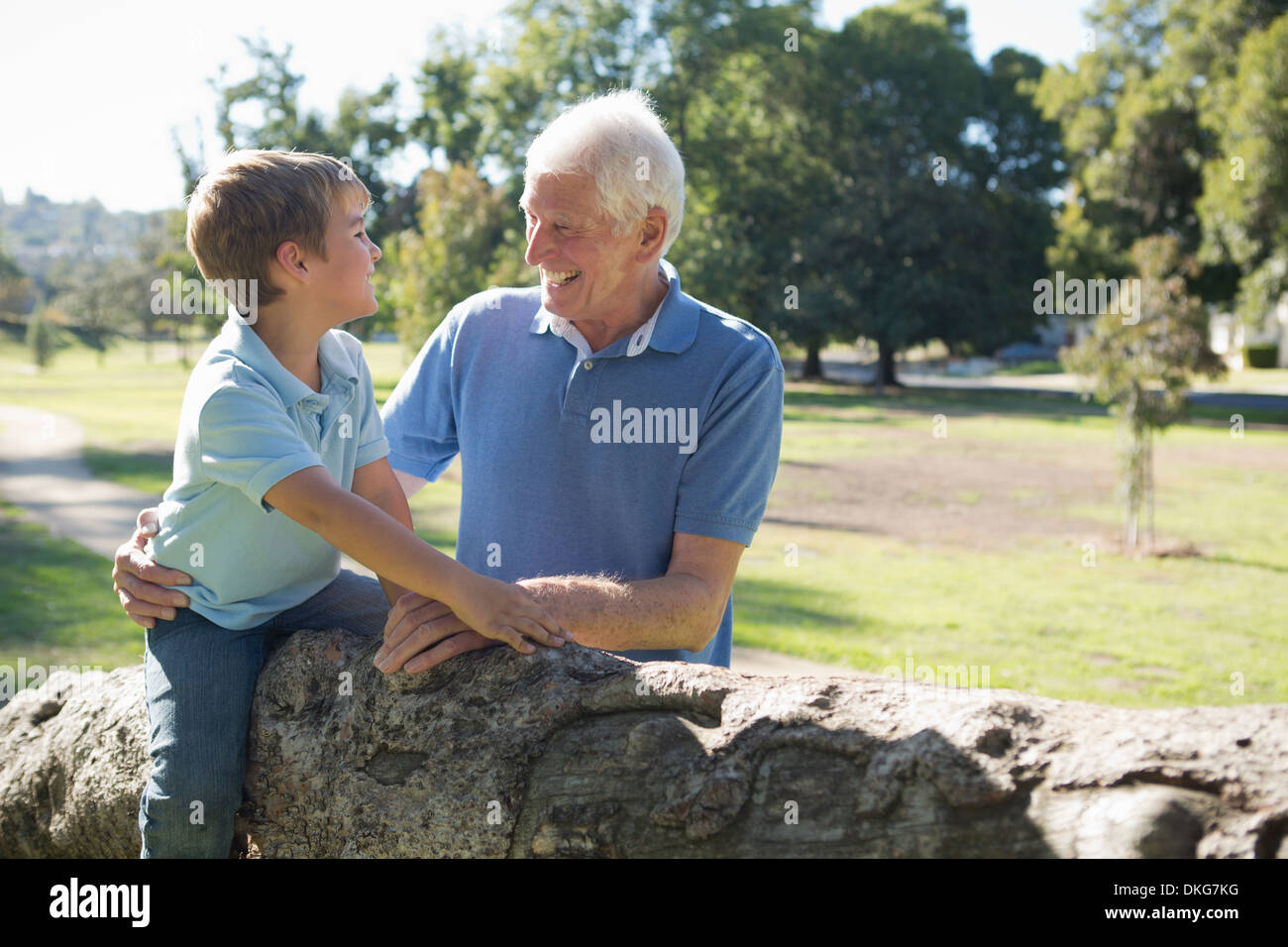 Grandfather grandson sitting on park hi-res stock photography and ...