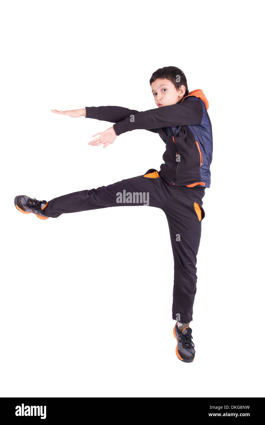 Young boy jumping isolated in white Stock Photo - Alamy