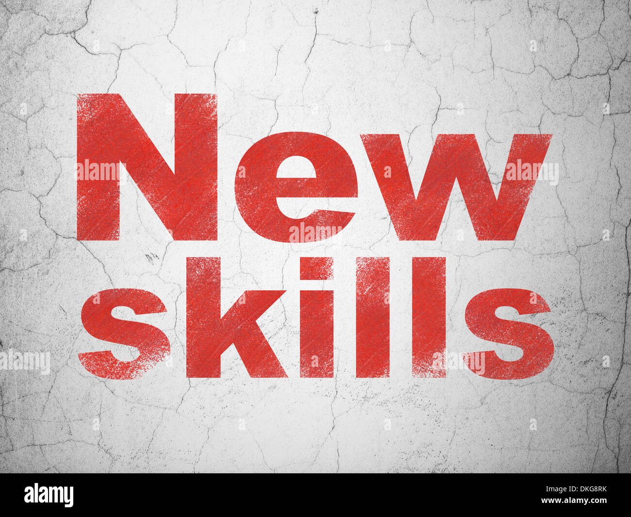 Education concept: New Skills on wall background Stock Photo - Alamy