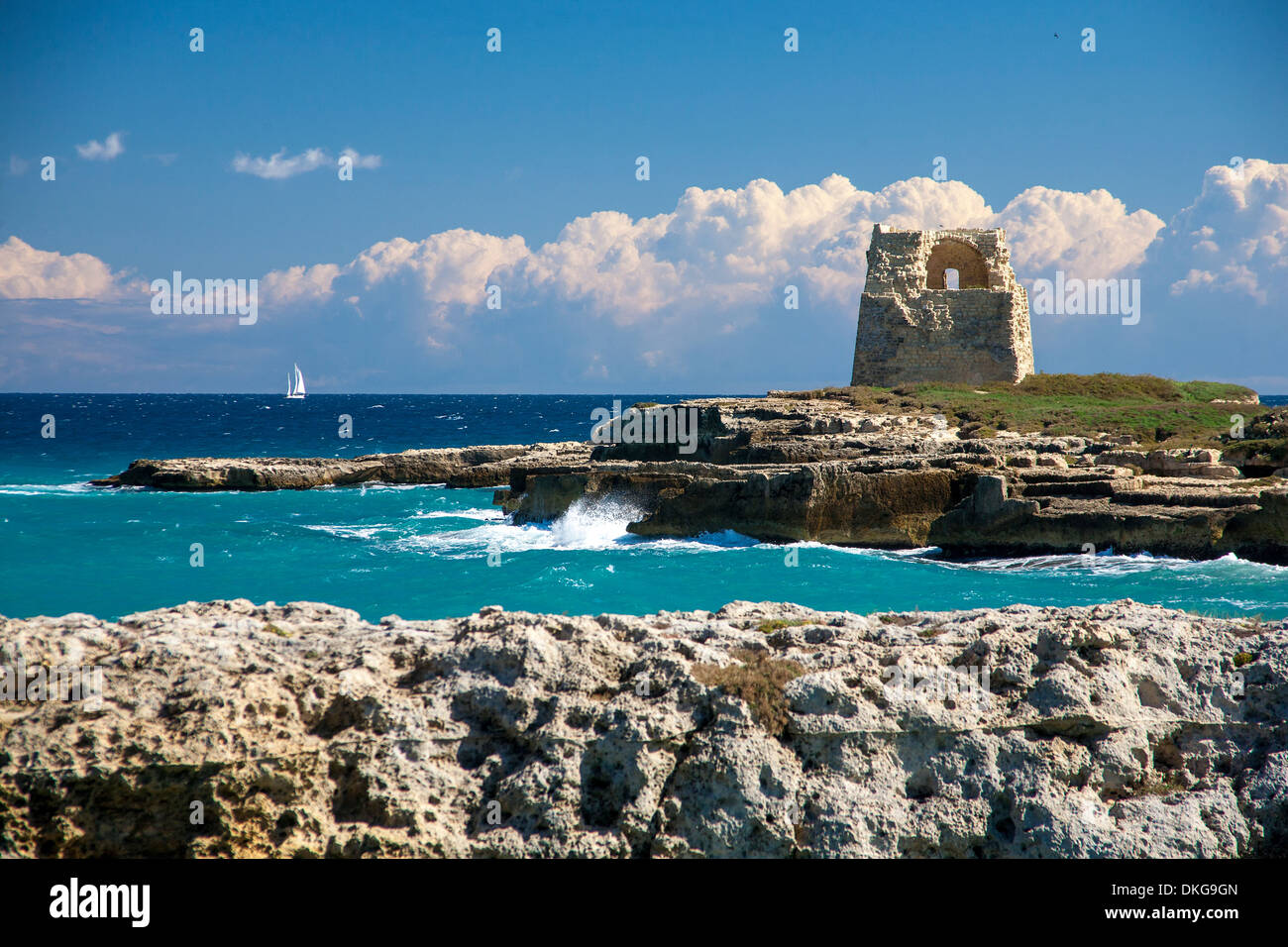 Puglia coastline with watchtower and yacht Stock Photo - Alamy
