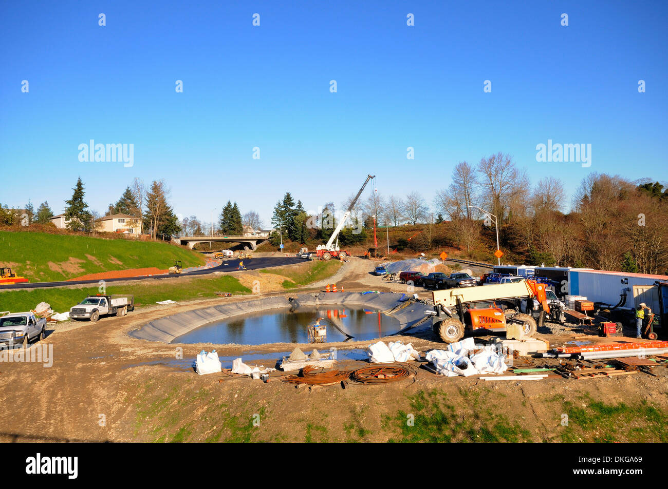 Construction site with fluid collection basin. This was a highway ...