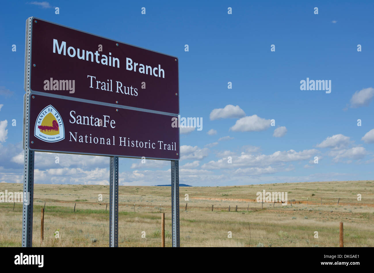 A marker tells the story of the surrounding landscape - old wagon wheel ...