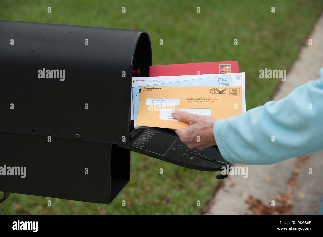 US mail box collecting mail from the mailbox Stock Photo - Alamy