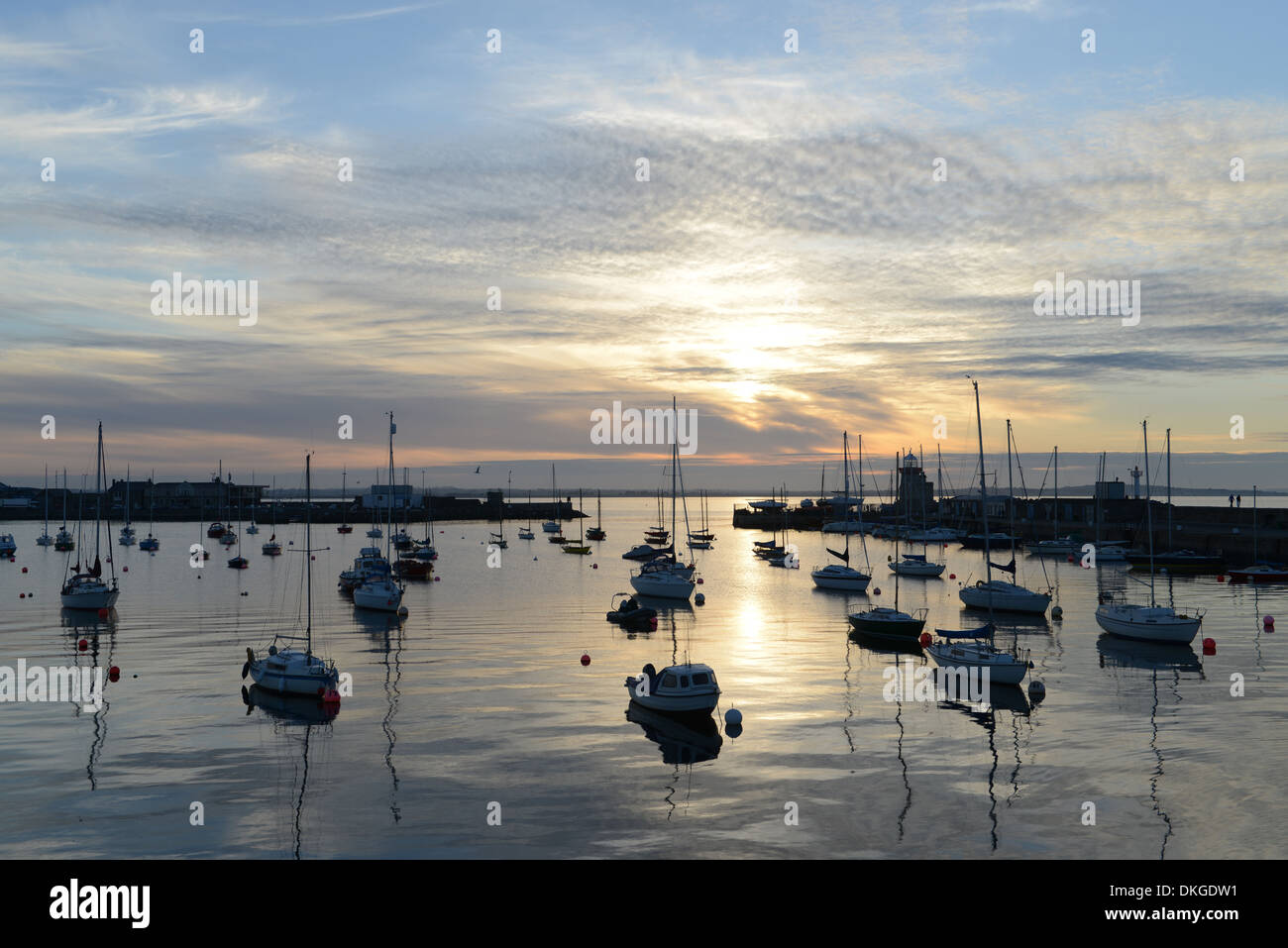 Sunset on the peaceful harbor at Howth (Dublin bay area - Ireland Stock ...