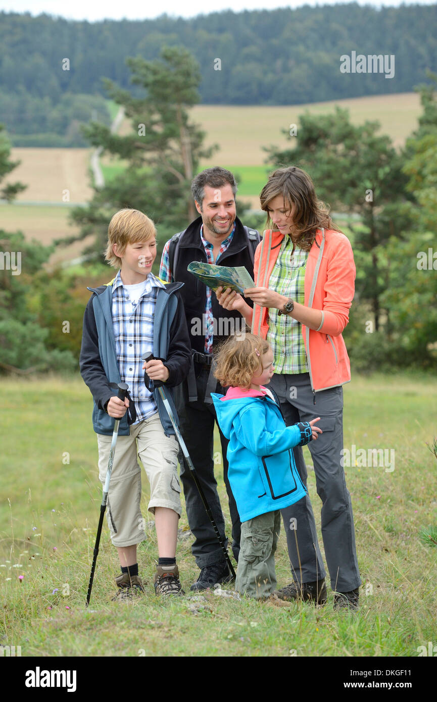 Family on a hiking tour Stock Photo - Alamy