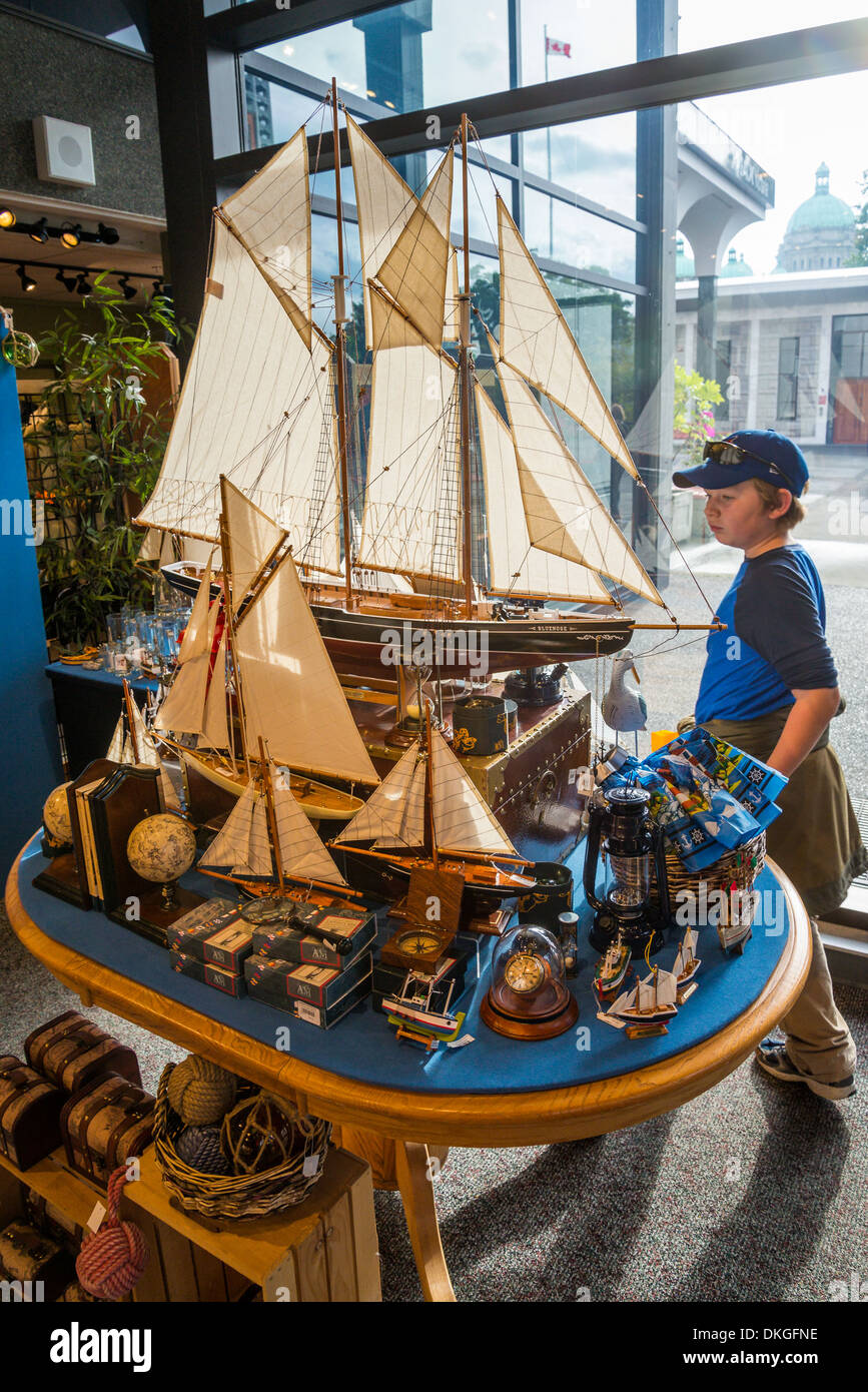 Boy in gift shop with sailboat display bluenose bluenose sailboats hi ...